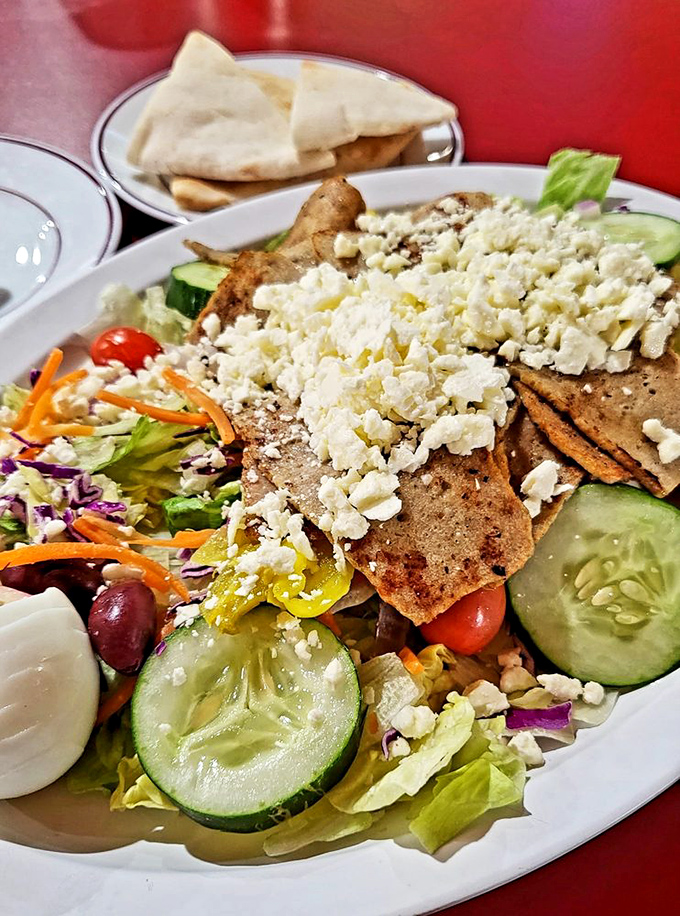 This Greek salad comes loaded with feta, olives, and enough fresh vegetables to make you feel virtuous before dessert.