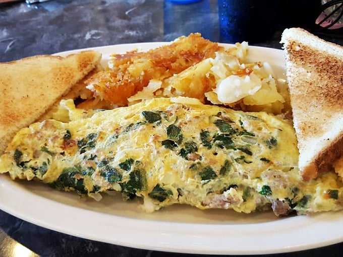 An omelet that doesn't just contain vegetables&mdash;it celebrates them. Paired with golden home fries that crackle with each bite.