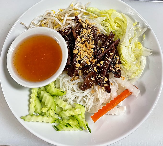 Grilled beef meets vermicelli in a beautifully composed bowl that proves Vietnamese cuisine is all about balanced, thoughtful presentation and flavor.