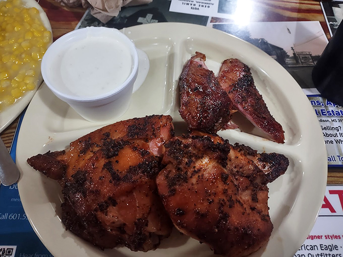 Barbecued chicken so perfectly charred, it makes you wonder if the smoke ring deserves its own place in the culinary hall of fame.