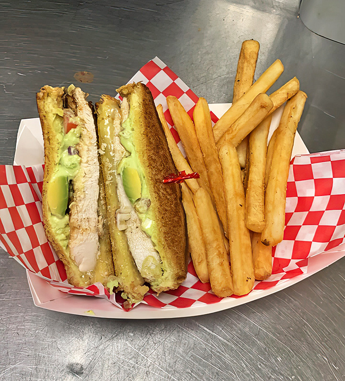 This isn't just a sandwich; it's architecture &ndash; layers of grilled chicken, fresh vegetables, and creamy avocado creating the Taj Mahal of lunch options.