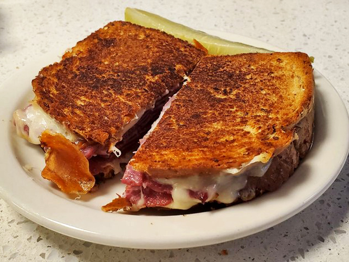 The grilled pastrami sandwich at Lucky Wishbone isn't just lunch&mdash;it's a masterpiece of melted cheese and perfectly crisped bread that would make your cardiologist wince and your taste buds applaud.