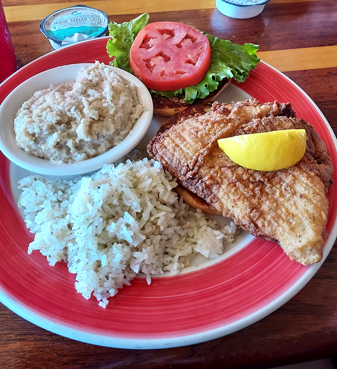 This grouper sandwich isn't just lunch&mdash;it's Florida on a bun, with rice and grits playing perfect supporting roles.