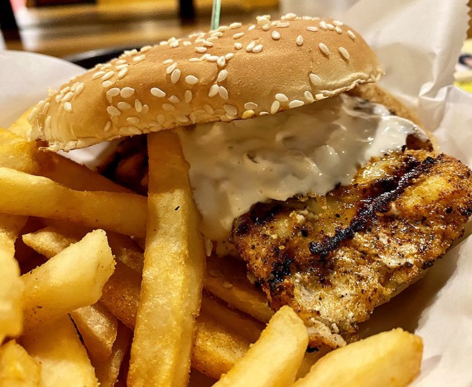 This fish sandwich doesn't need ocean views to transport you to paradise &ndash; just golden-fried perfection, crisp fries, and a sesame bun throne.