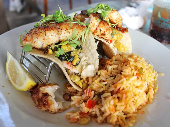 Fish tacos that make you question every other taco you've ever committed to memory. That seasoned rice isn't just a sidekick.