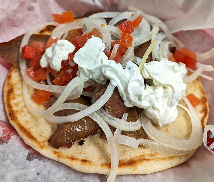 This isn't just a gyro &ndash; it's a handheld Mediterranean vacation topped with tzatziki sauce that would make Zeus himself nod in approval.