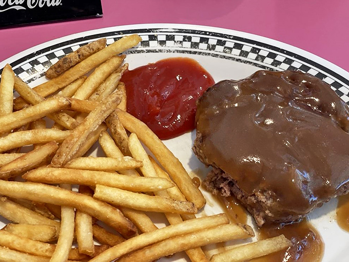 That hamburger steak drowning in gravy isn't just dinner &ndash; it's comfort food therapy you didn't know you desperately needed.