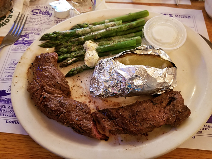 Who needs fancy when you've got a perfectly cooked steak, asparagus, and a foil-wrapped potato? Simple food done right is culinary poetry.