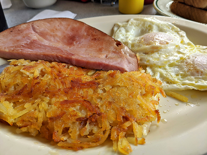 Breakfast perfection on a plate&mdash;crispy hash browns with that golden exterior that makes the morning worth facing.