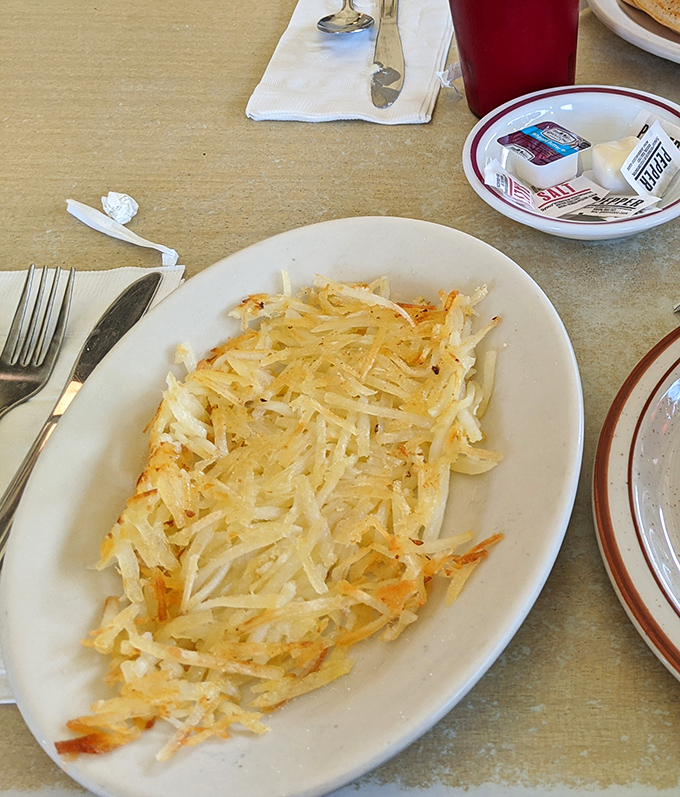Hash browns that achieve the impossible balance&mdash;crispy exterior, tender interior. The kind that make you wonder why you'd ever eat potatoes any other way.