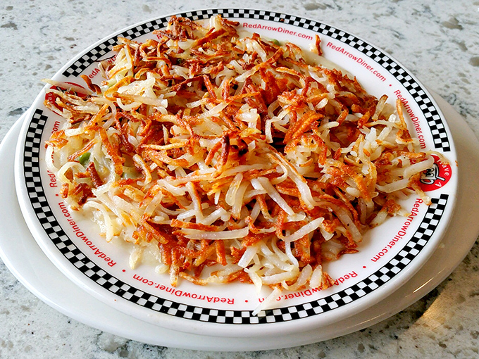 These aren't just hash browns; they're a crispy, golden-brown masterpiece that makes you wonder if potatoes were put on earth specifically for this divine purpose.