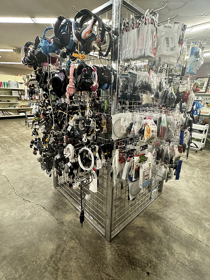 The accessories wall &ndash; a tangled web of technological history and fashion statements. One person's forgotten headphones become another's vintage find.