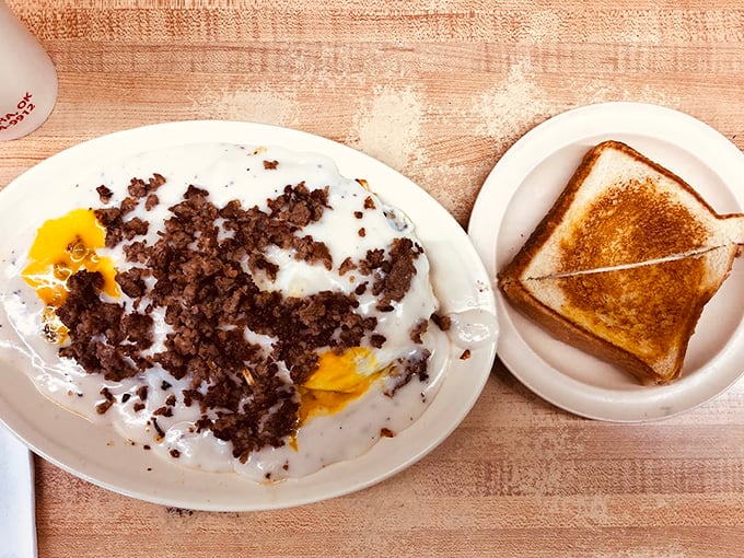 Breakfast of champions! This plate of country gravy and ground beef with toast isn't asking for likes&mdash;it's demanding respect and offering comfort in return.