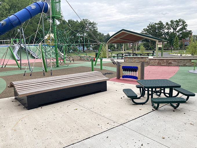 Modern play meets thoughtful design at this community park. The blue slide practically begs for a test run, regardless of your age.