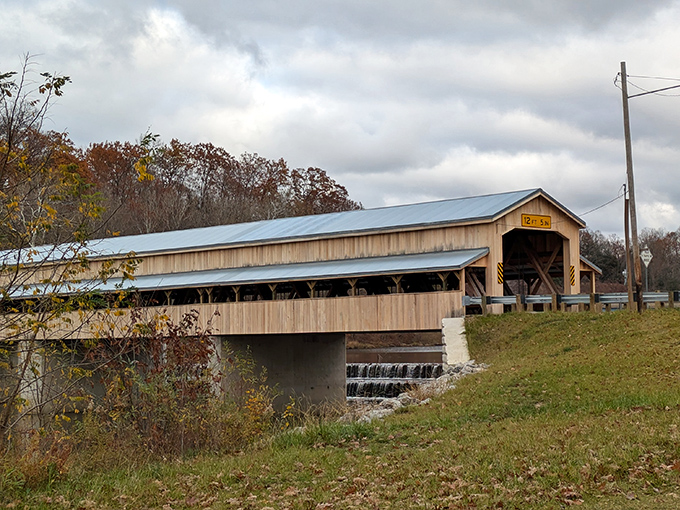 The Historic Harpersfield Covered Bridge &ndash; where modern traffic meets 19th-century engineering in a relationship that somehow works better than most dating apps.