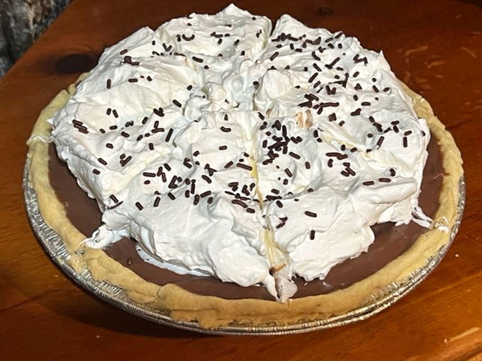Cloud-like meringue meets silky chocolate filling in a pie that makes you wonder why anyone bothers with fancy desserts requiring blowtorches or liquid nitrogen.