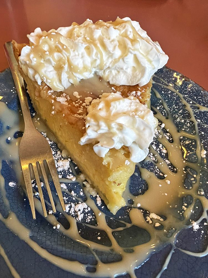 Pie that makes you consider moving to Idaho. The whipped cream mountain and caramel drizzle aren't just toppings&mdash;they're a lifestyle choice.