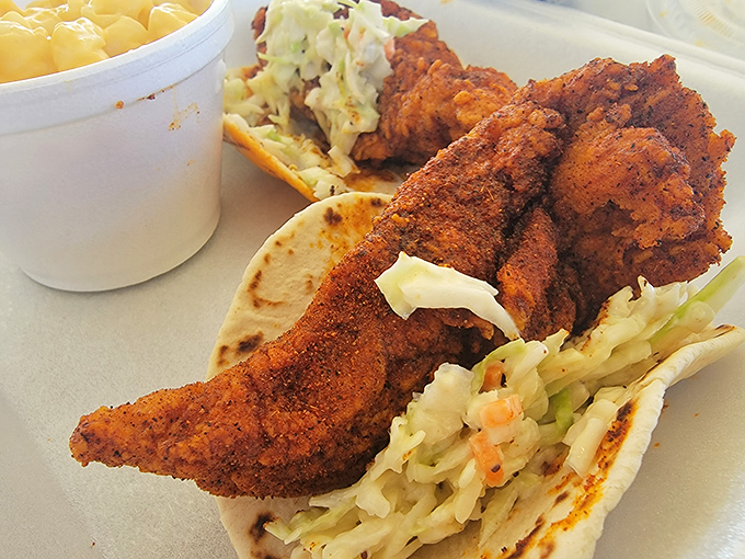 These hot chicken pieces nestled on soft tortillas with slaw create Nashville's answer to the taco—cultural fusion at its most delicious.