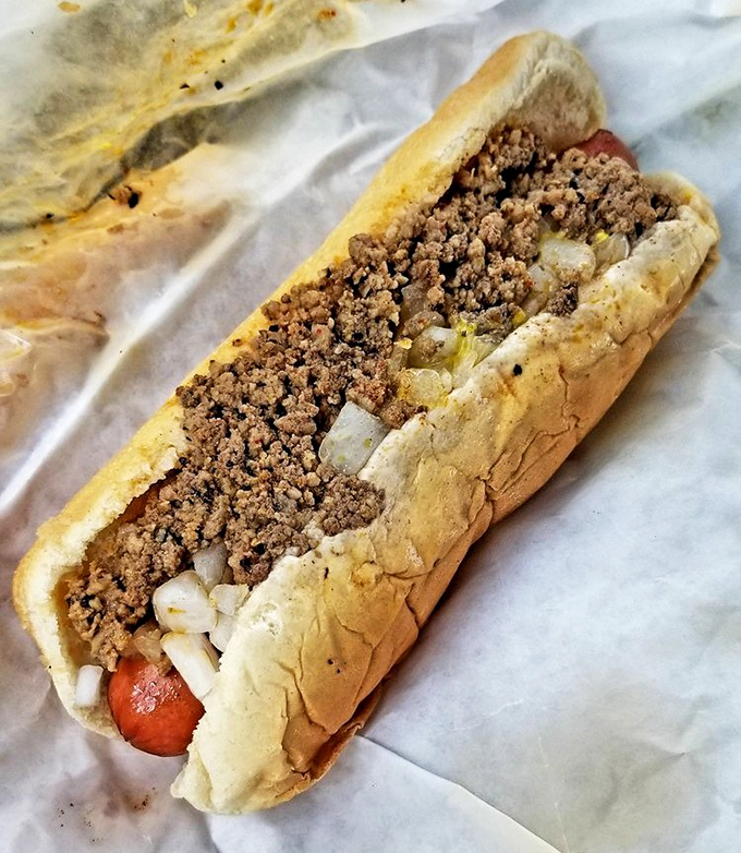 The hot dog "all the way" &ndash; where that legendary homemade chili transforms an everyday frank into something transcendent.