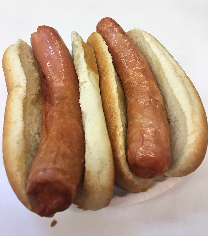 Meet the stars of the show: deep-fried hot dogs with that signature split that announces their perfect doneness.