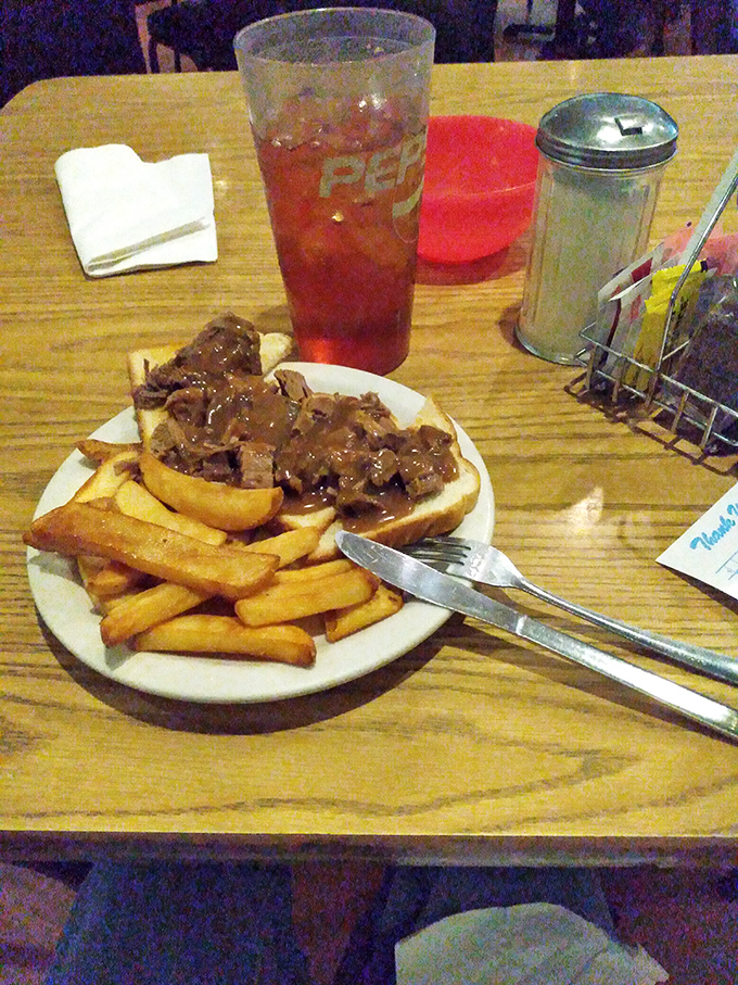 The hot roast beef sandwich &ndash; where gravy isn't just an addition, it's practically a spiritual experience flooding across Texas toast.