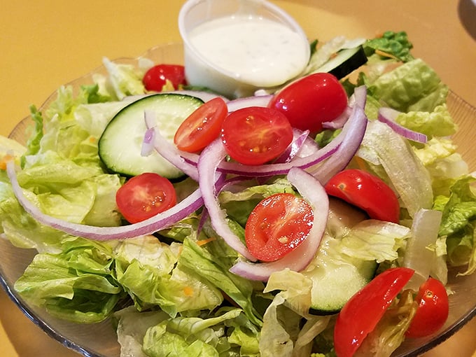 A garden on a plate! This salad isn't just the opening act&mdash;it's fresh enough to make you momentarily forget you came for pizza.