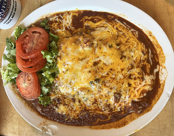 Christmas comes daily with this red chile smothered masterpiece. The perfect huevos rancheros isn't just a meal, it's a New Mexican birthright.
