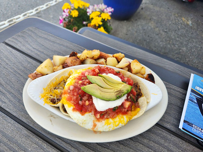 The Huevos Rancheros arrives like a fiesta on a plate &ndash; vibrant salsa, creamy avocado, and melted cheese creating the breakfast equivalent of a mariachi band.