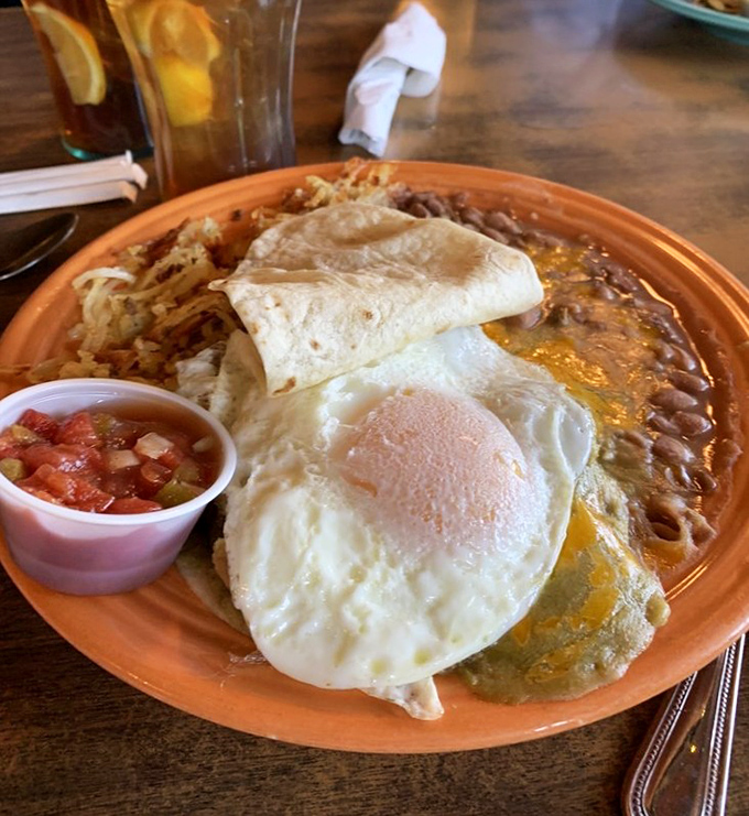 Breakfast nirvana achieved! This colorful plate of huevos rancheros proves that mornings in Flagstaff come with their own special kind of sunshine.