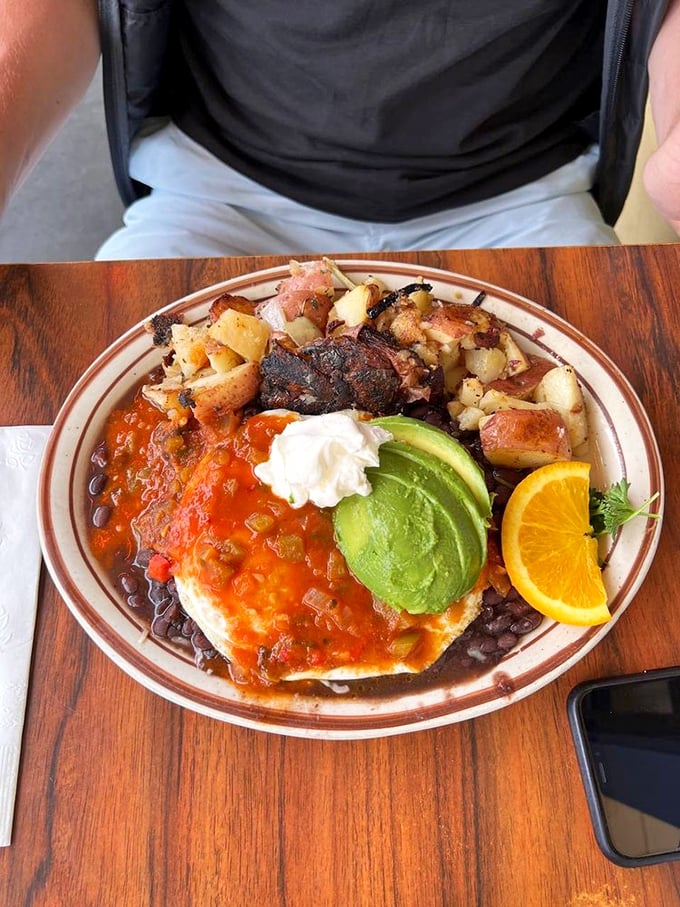 Huevos Rancheros that would make your abuela proud&mdash;a fiesta of colors with that perfectly ripe avocado stealing the spotlight.