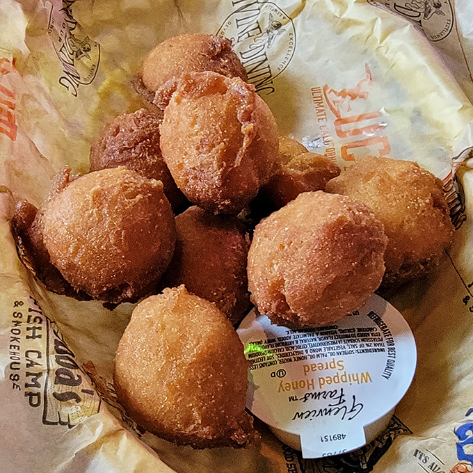 Hushpuppies so perfectly golden they deserve their own spotlight. Crispy exterior, pillowy interior &ndash; the unsung heroes of any proper seafood feast.