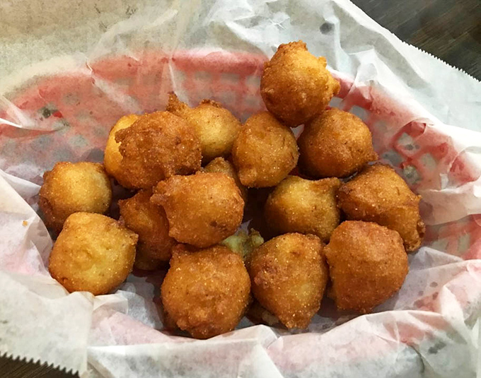 These golden orbs of cornmeal perfection aren't just hushpuppies&mdash;they're edible Southern history, crispy on the outside and cloud-soft within.
