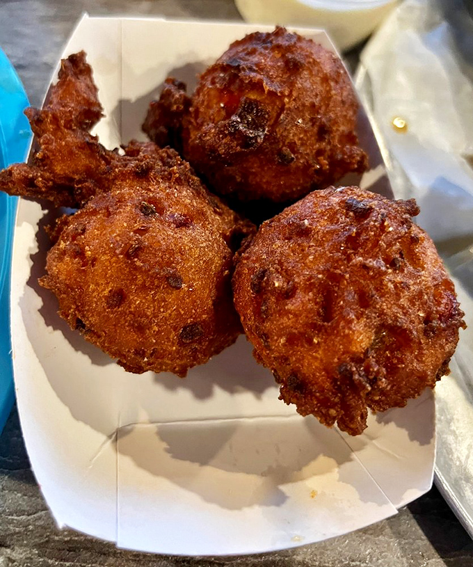 These hushpuppies aren't just fried dough&mdash;they're little golden orbs of happiness that would make your cardiologist wince and your taste buds sing.