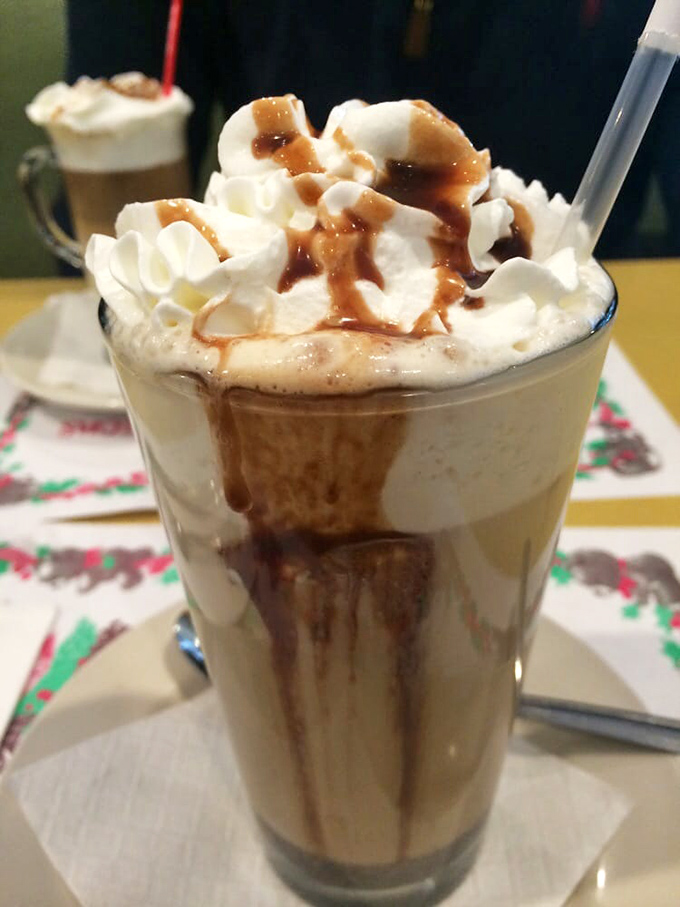 This isn't just a coffee drink; it's a dessert masquerading as a beverage, complete with whipped cream mountain and caramel rivers. Caffeine never dressed so fancy.