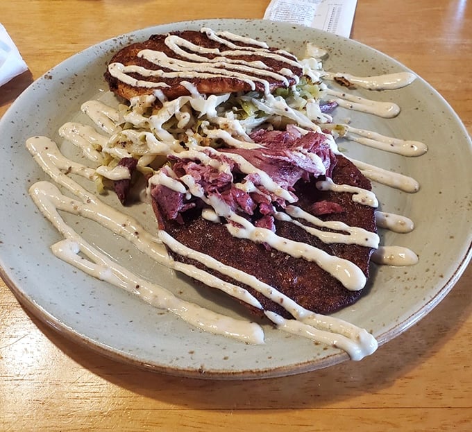 The Irish Boxty arrives like a work of art. Potato pancakes cradle tender corned beef, all drizzled with creamy sauce that would make your Irish grandmother weep with joy.