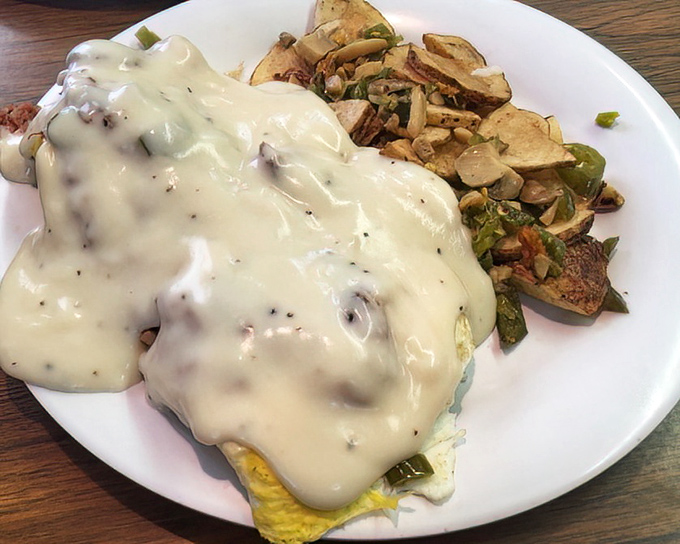 This Irish breakfast isn't playing around&mdash;eggs smothered in gravy alongside home fries that look like they've been practicing their crispy edges for decades.
