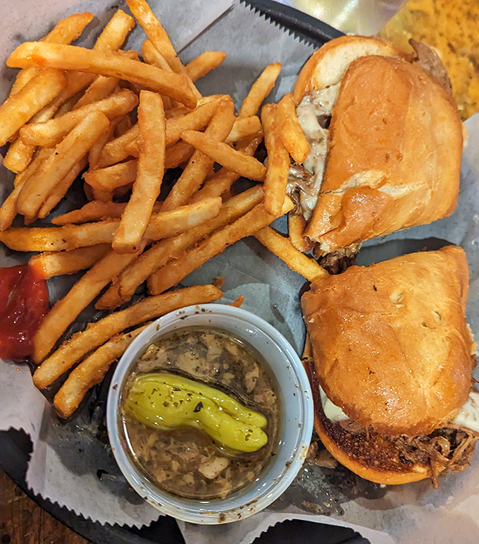 This Italian beef sandwich isn't just a meal, it's an event – complete with that perfect cheese pull that deserves its own slow-motion replay.