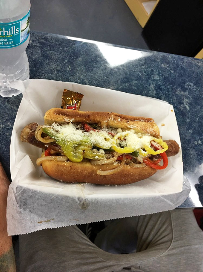 The Italian sausage comes dressed for success with colorful peppers and a dusting of parmesan&mdash;like a hot dog that went to fashion school.