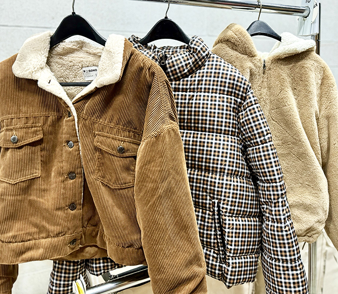 The jacket section: where corduroy meets puffer meets sherpa in a textile reunion that would make Tim Gunn proud.