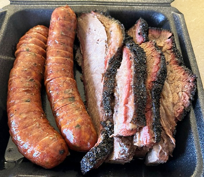 This isn't just sausage and brisket; it's a Texas trinity that would make even the most devout meat-lover drop to their knees in reverence.