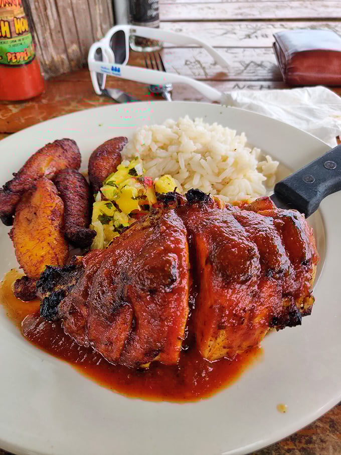 Jerk chicken with that perfect char, served with plantains and rice&mdash;proof that Caribbean flavors and Florida sunshine were made for each other.