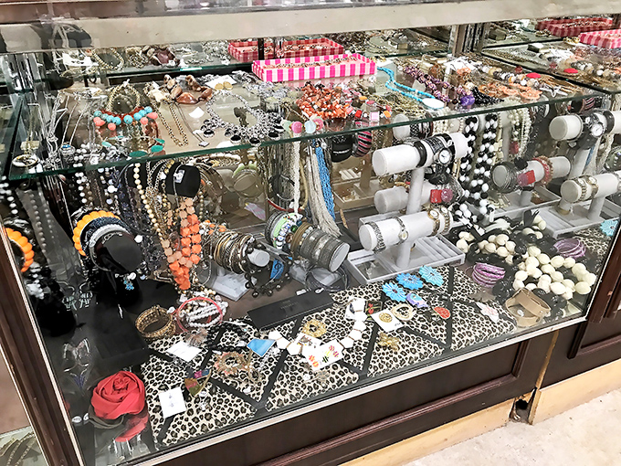 The jewelry counter gleams with possibilities&mdash;each piece carrying stories from previous lives while waiting to start new adventures with you.