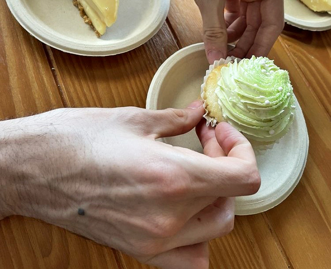 The key lime cupcake – where Florida's signature citrus gets dressed up for a fancy night out, complete with swirly white hat.