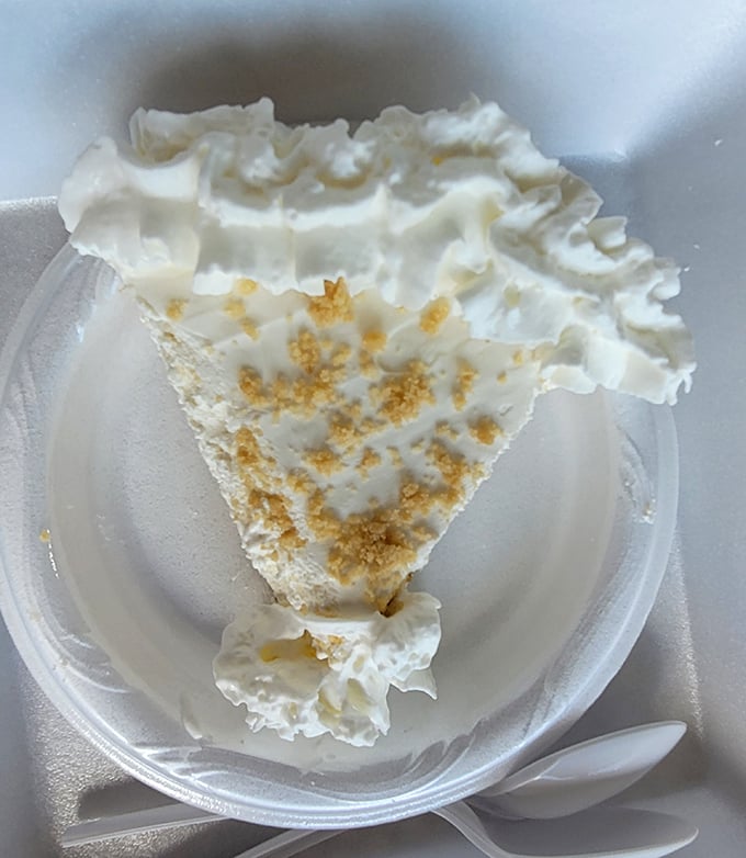 Key lime pie piled high with whipped cream, because sometimes more is actually more in the best way.
