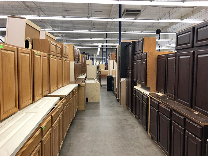 Cabinet heaven stretches as far as the eye can see. Walking this aisle feels like browsing an HGTV set where everything is mysteriously affordable.