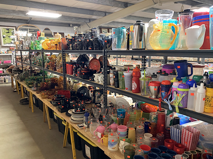 The kitchenware section could outfit a small restaurant. Colorful pitchers and vintage thermoses stand ready for their second act.