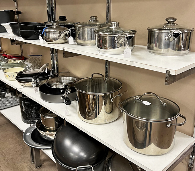Stainless steel cookware gleams like armor for kitchen warriors ready to conquer culinary mountains.