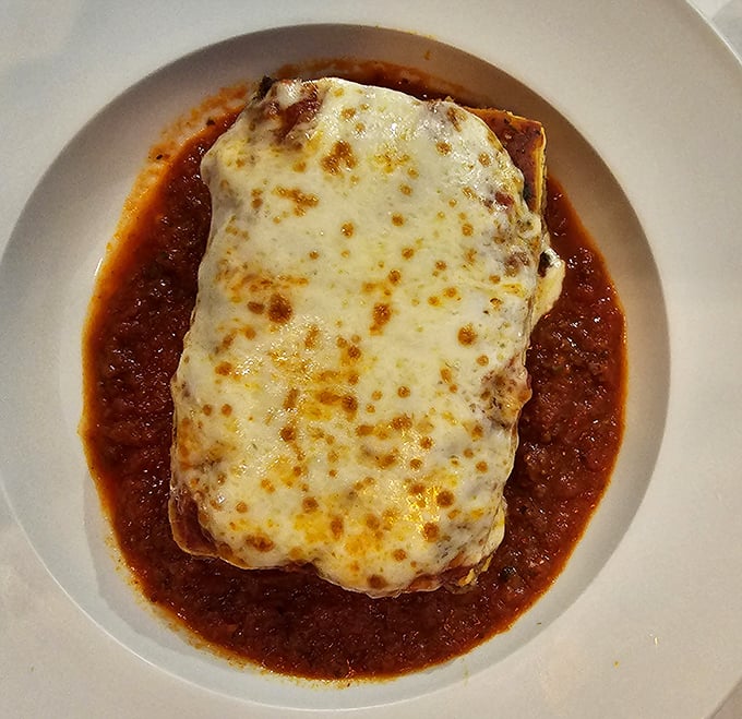 This isn't just lasagna; it's a geological event &ndash; layers of pasta, cheese, and sauce that would make any nonna weep with pride.