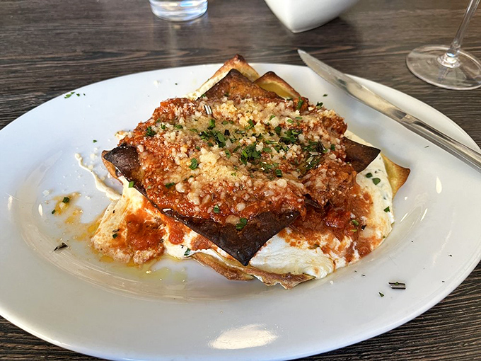 Layers of pasta, sauce, and cheese in perfect harmony. This lasagna doesn't just satisfy hunger &ndash; it resolves existential crises one bite at a time.