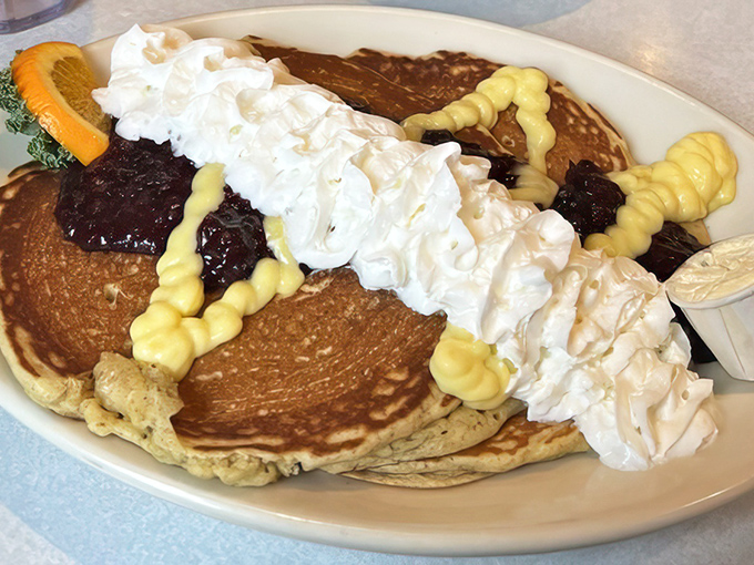 This isn't just a stack of pancakes&mdash;it's a mountain of joy topped with whipped cream, blueberry compote, and enough happiness to fuel your entire day.